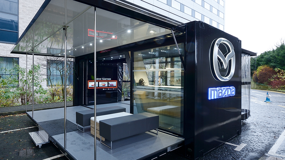 Blog: Mazda double expanding sales container - NEAT Vehicles